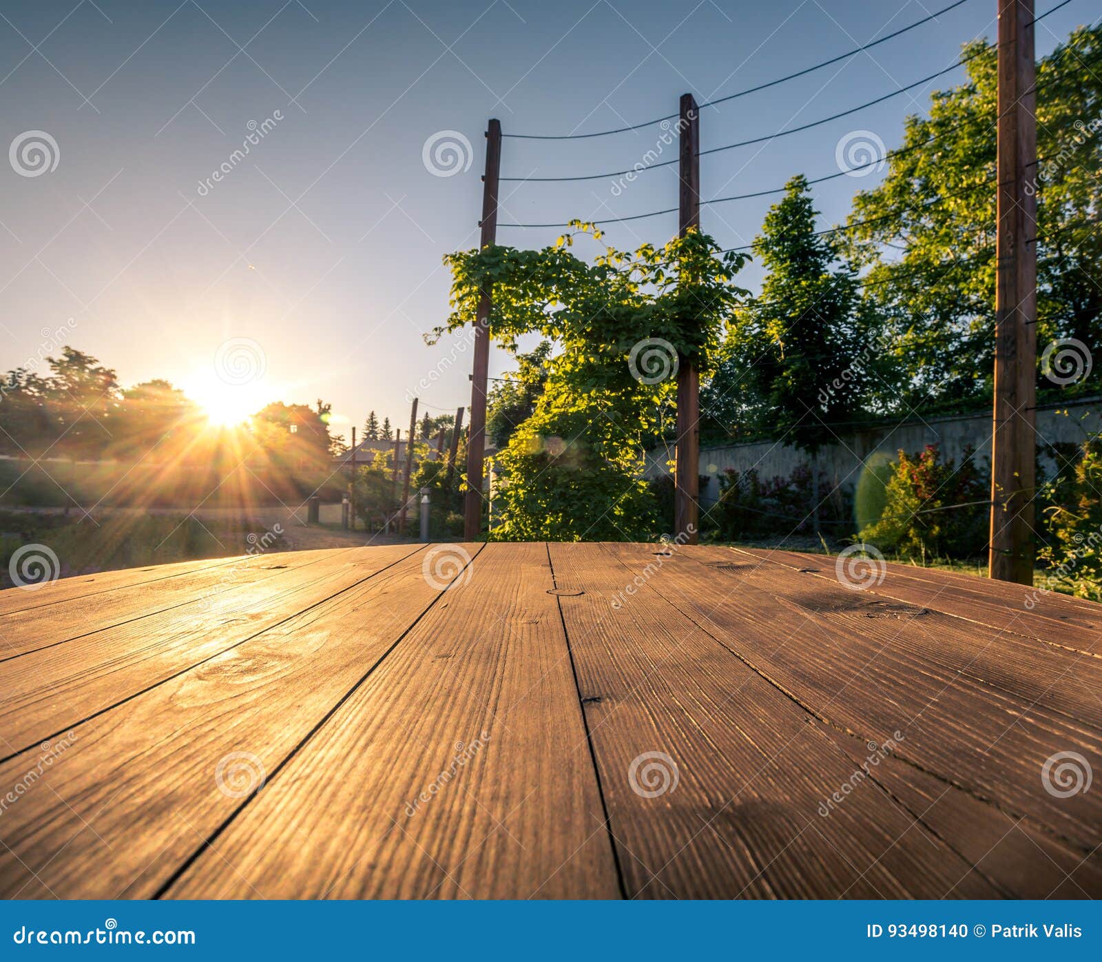 The Sun Shining on a Wooden Table in the Park. Stock Photo - Image of ...