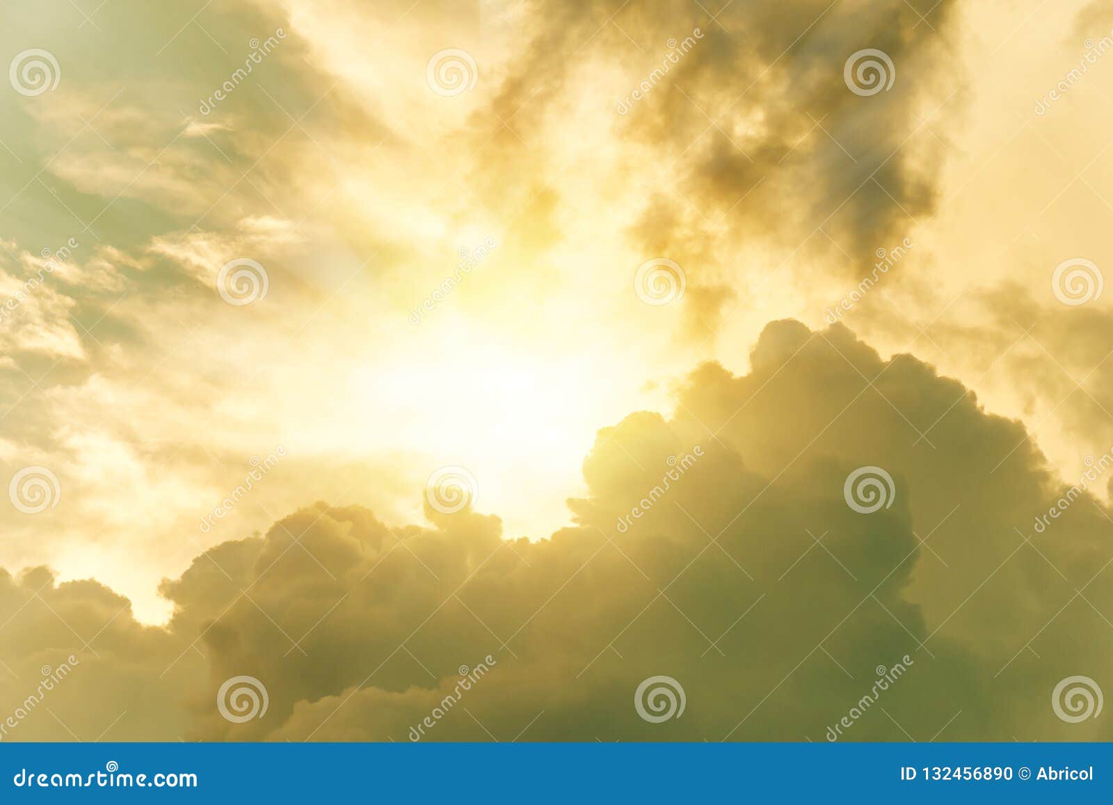 Sun Shining through Yellow Dramatic Clouds in Sky Stock Photo - Image ...