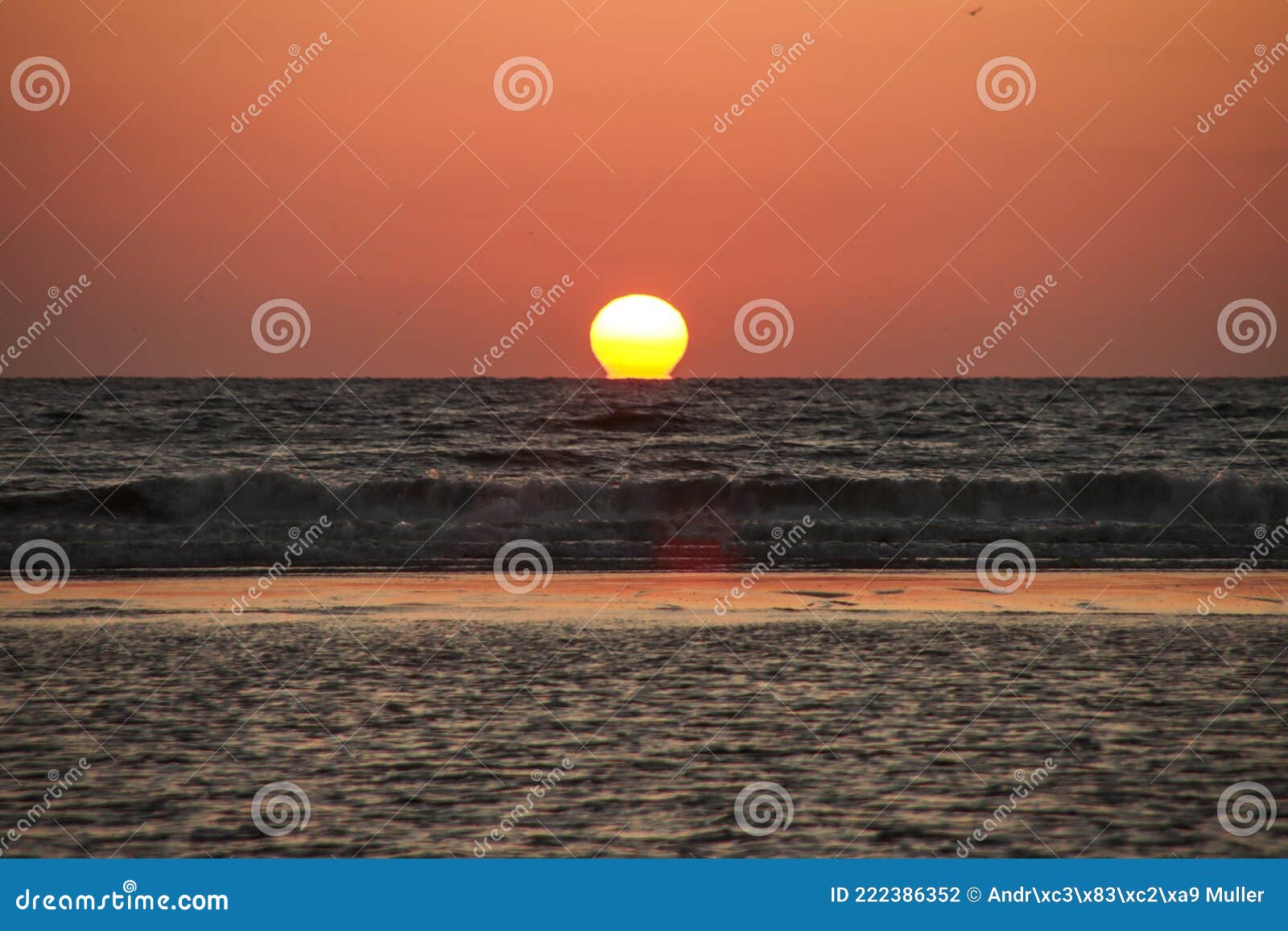 Sun Sinks into the Sea on the Beach of Katwijk with Colorful Sky Stock ...