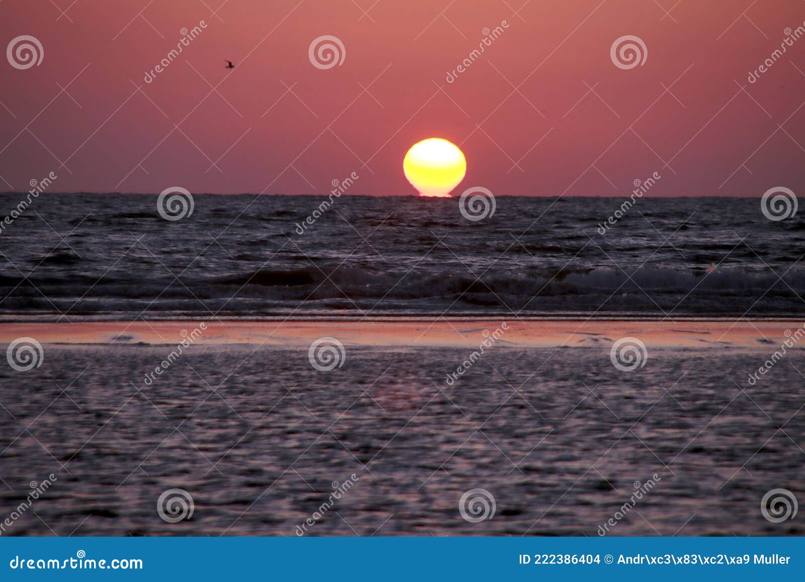 Sun Sinks into the Sea on the Beach of Katwijk with Colorful Sky Stock ...