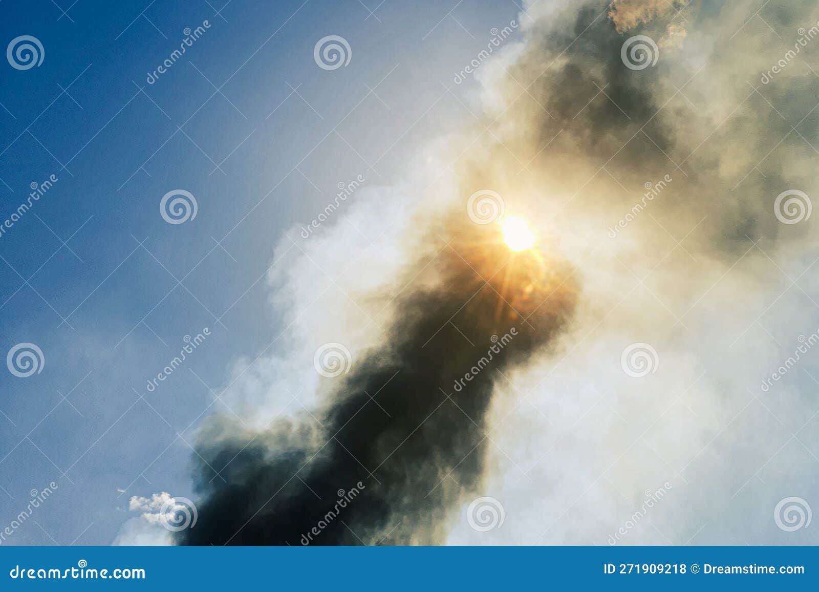 The Sun in the Sky through a Column of Smoke from a Large Fire among ...