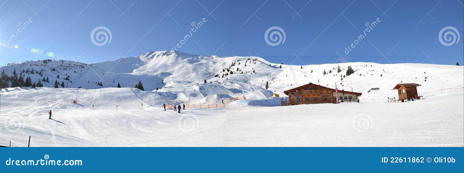 Sun on the slopes editorial photography. Image of piste - 22611862