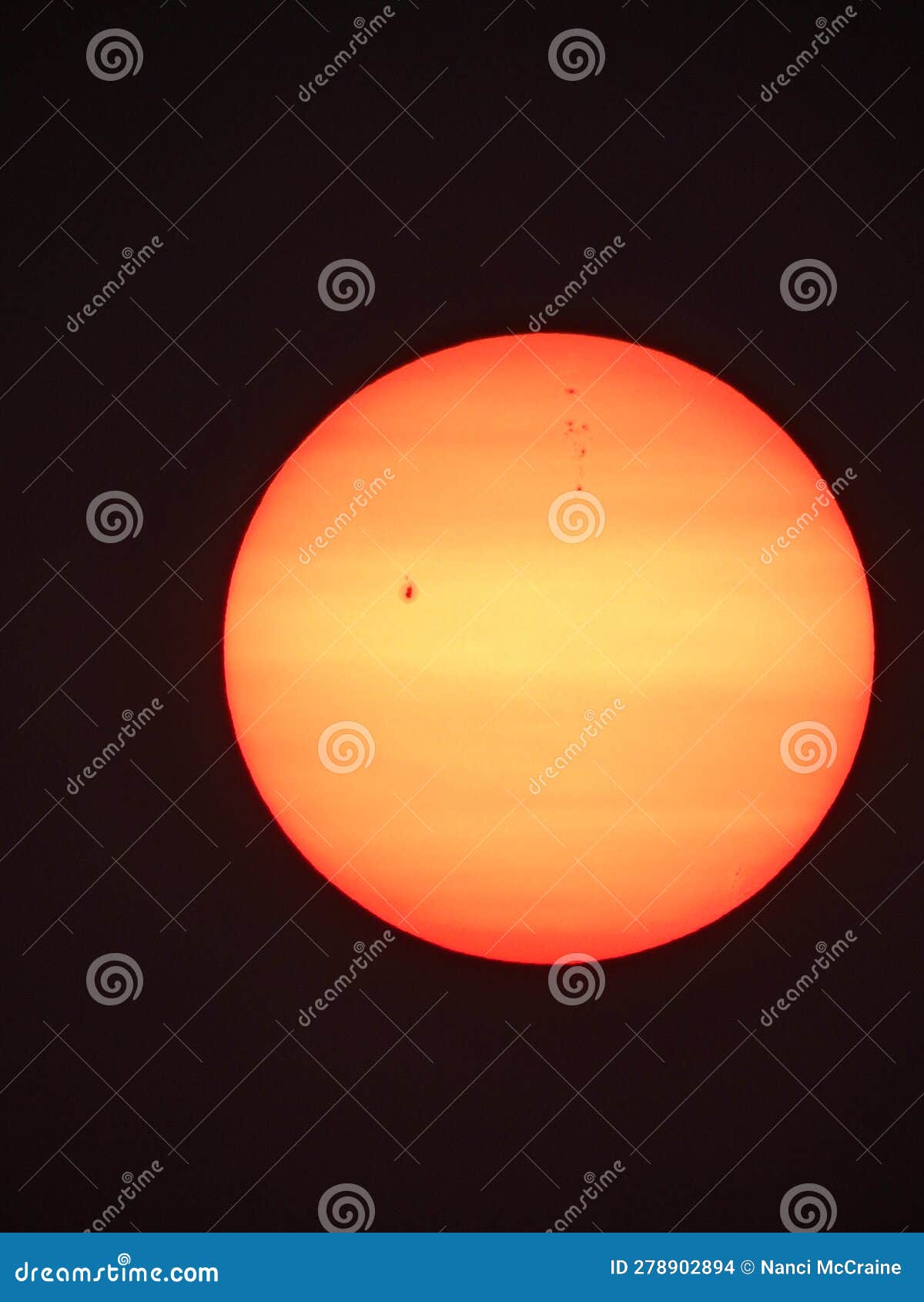 Sun Visible through Smoke Haze Showing Giant Sunspots. Stock Photo ...