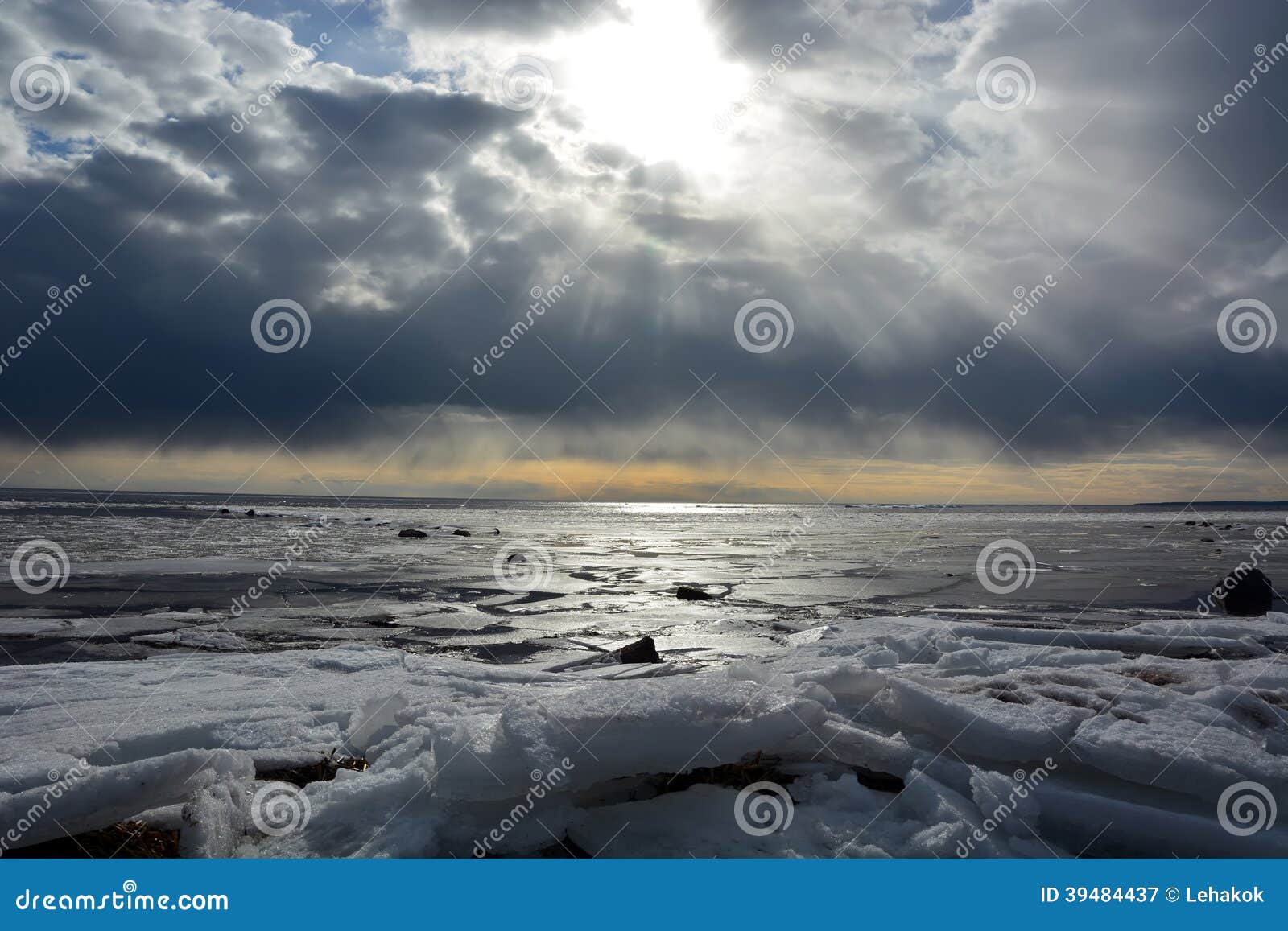 Sun through the Stormy Clouds at the Frozen Sea Stock Image - Image of ...