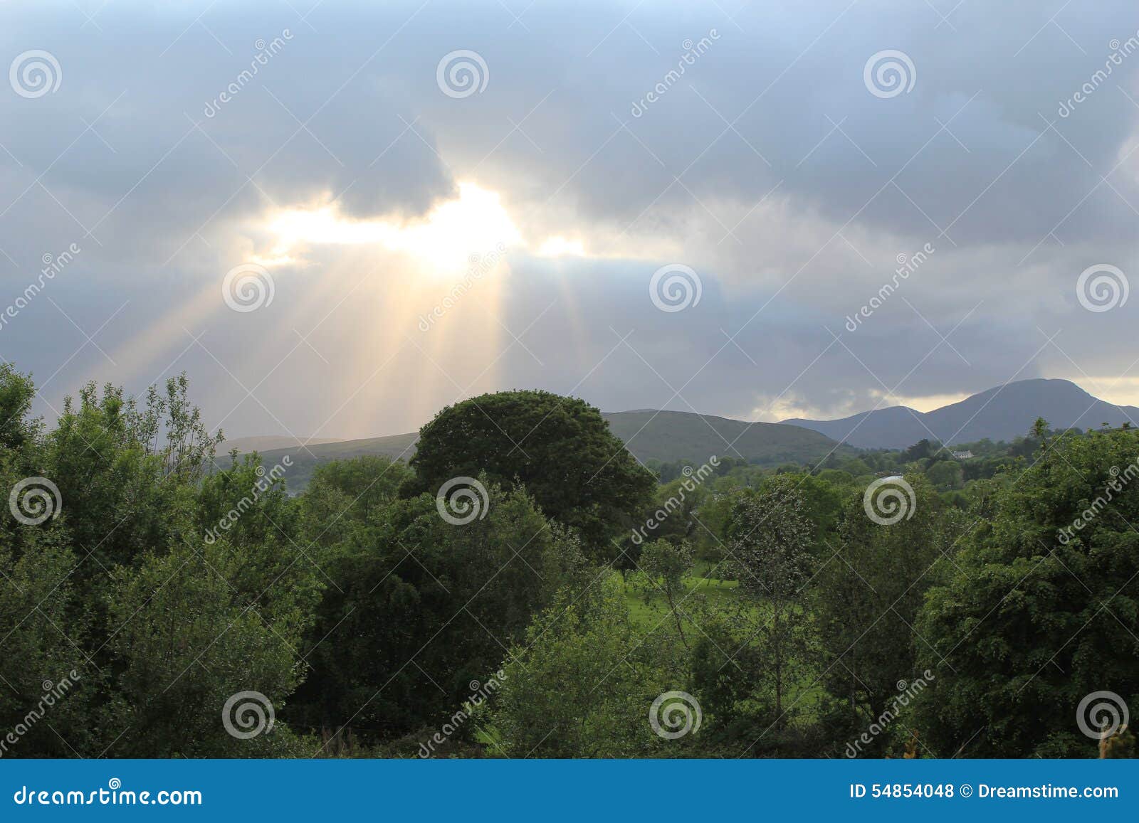 Sun Streaming through Clouds Stock Photo - Image of rays, vista: 54854048