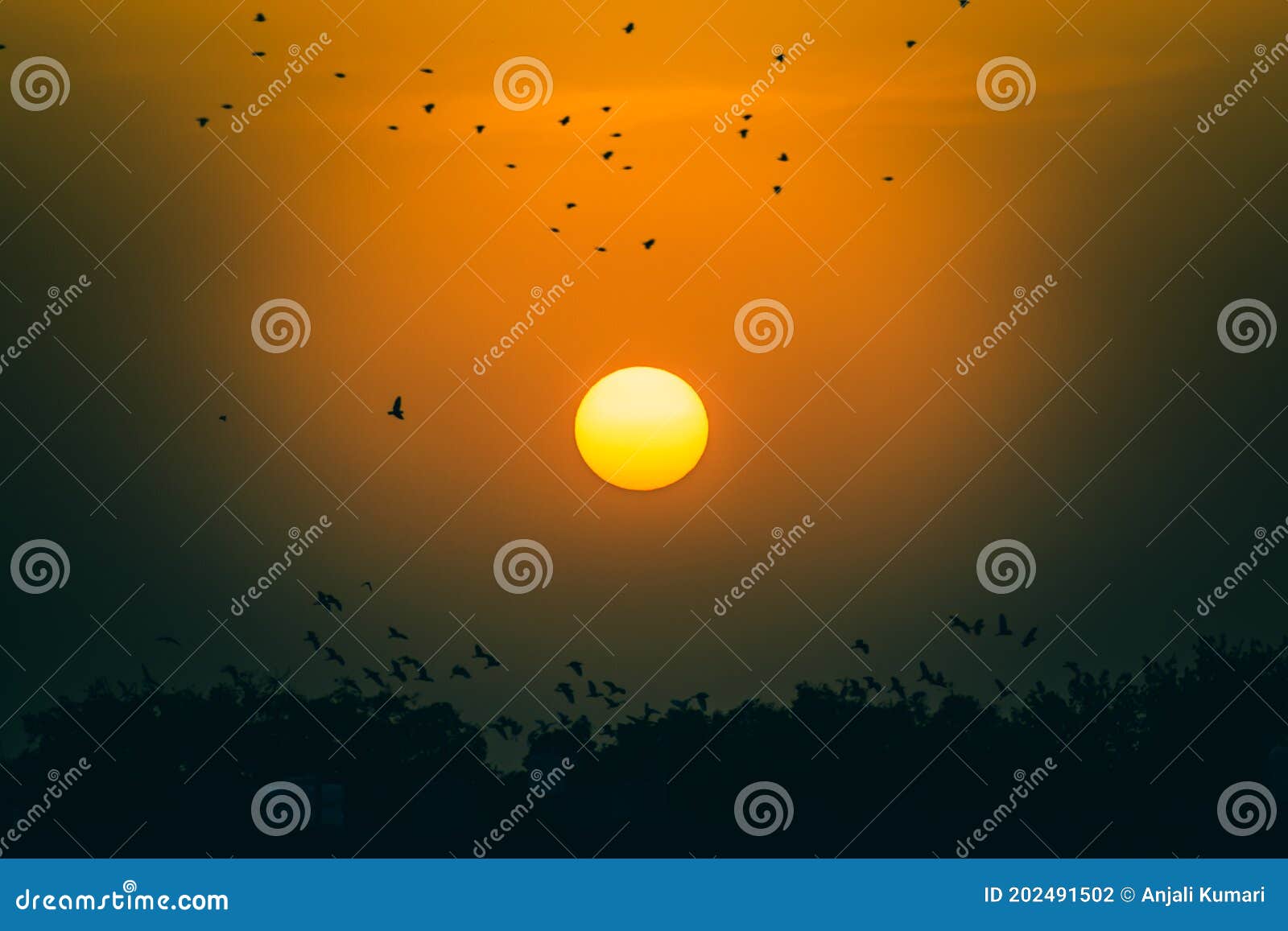 Sun during Sunset with Reddish Glow in Clouds Stock Photo - Image of ...