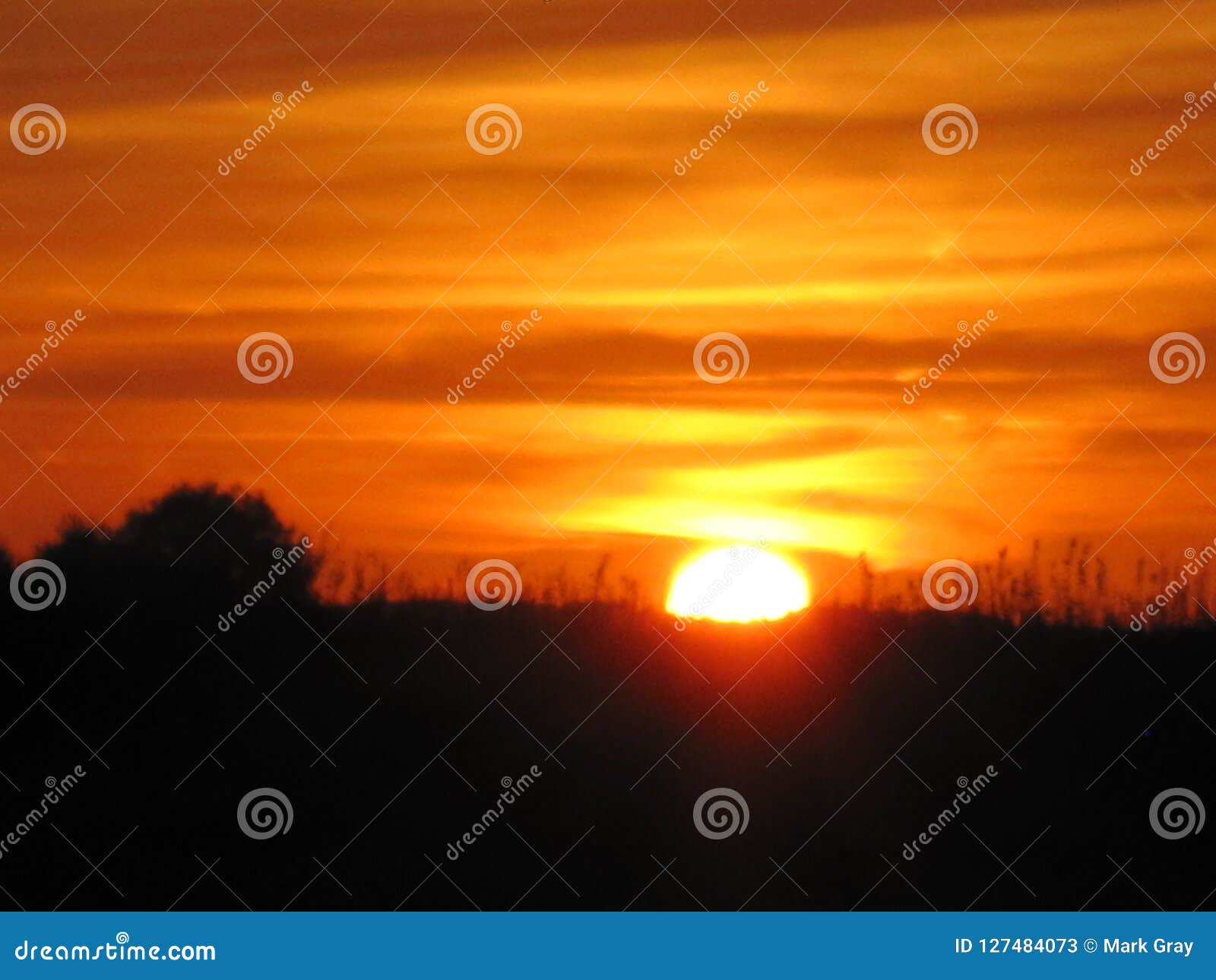 Sinking Sun stock image. Image of sinking, sunset, orange - 127484073