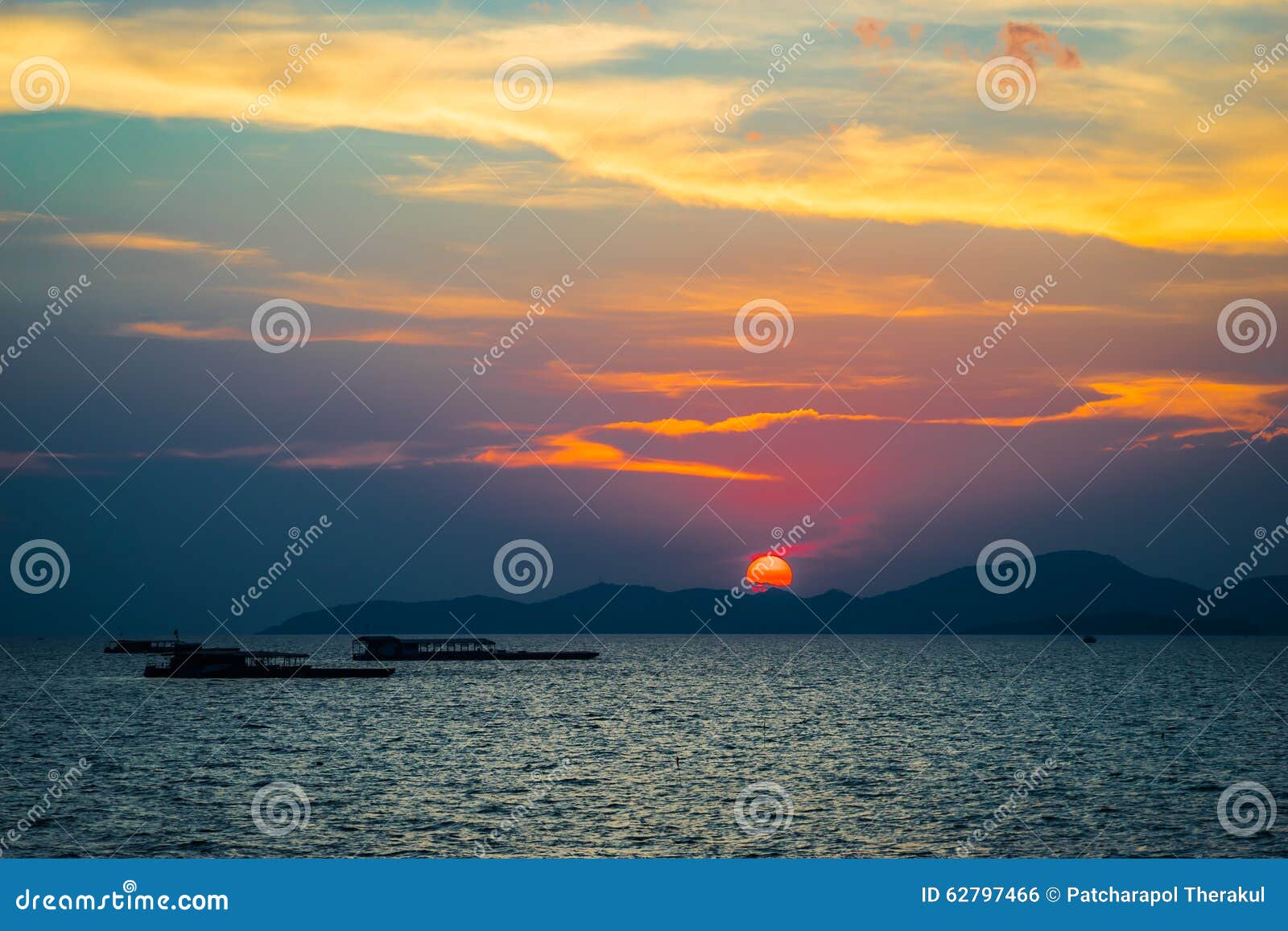The Sun before Sunset View from the Sea Stock Photo - Image of mountain ...