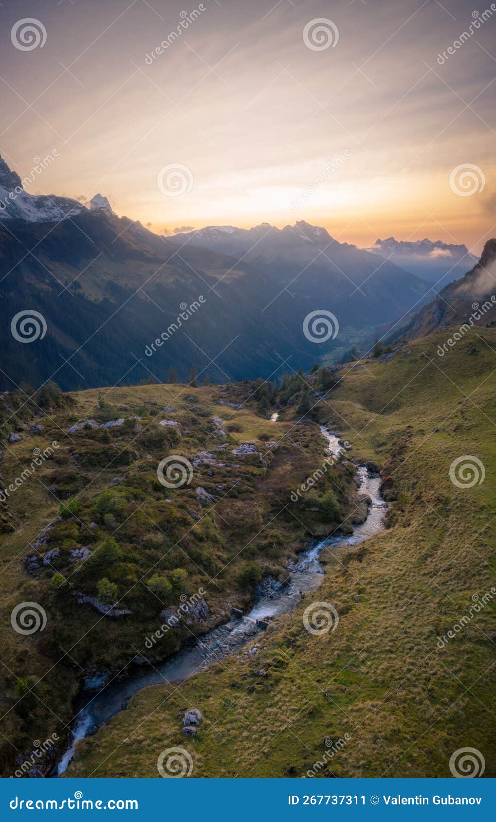 Sun walk in the mountains stock image. Image of blue - 267737311