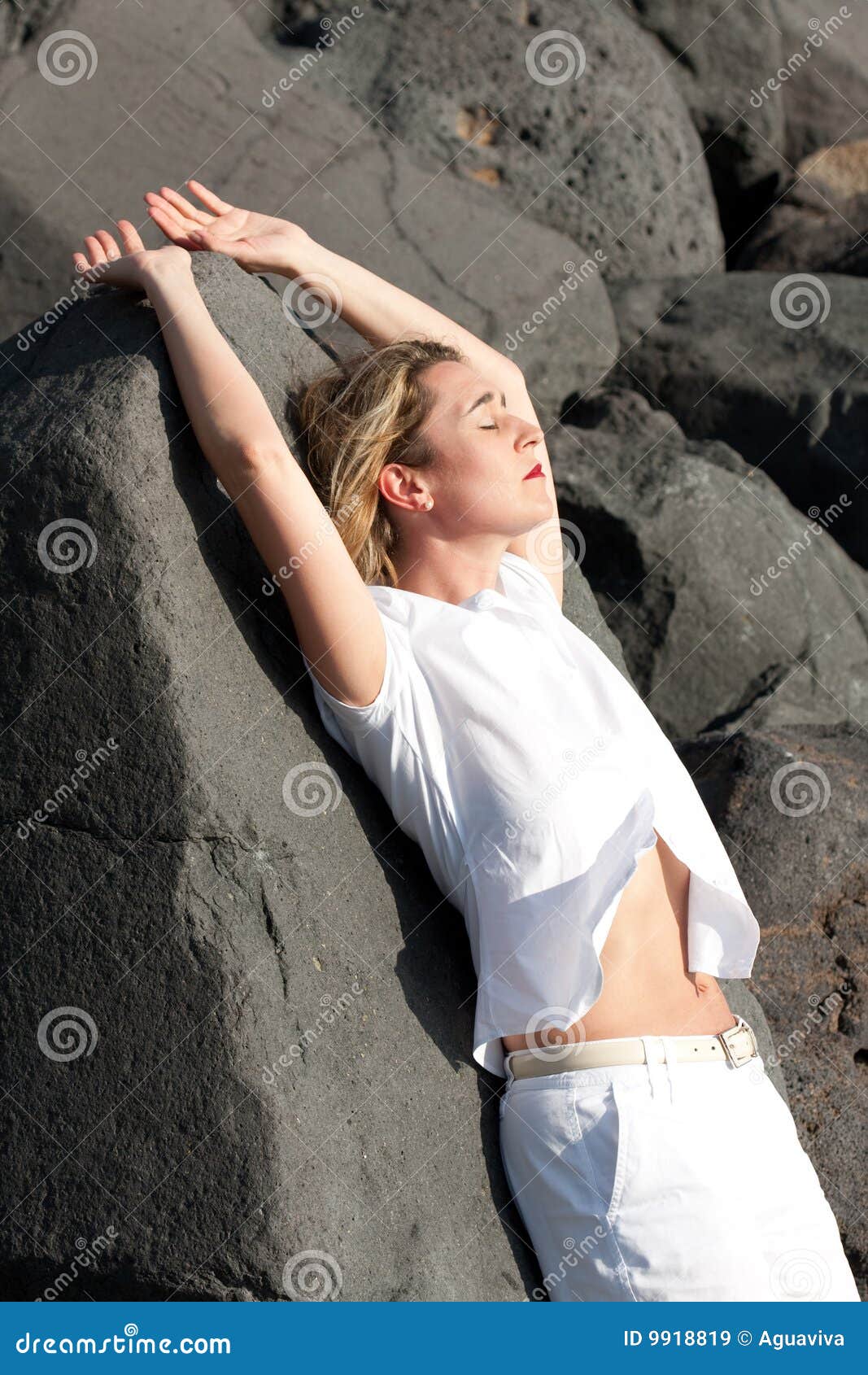 Sunbath stock image. Image of color, single, ocean, rock - 9918819
