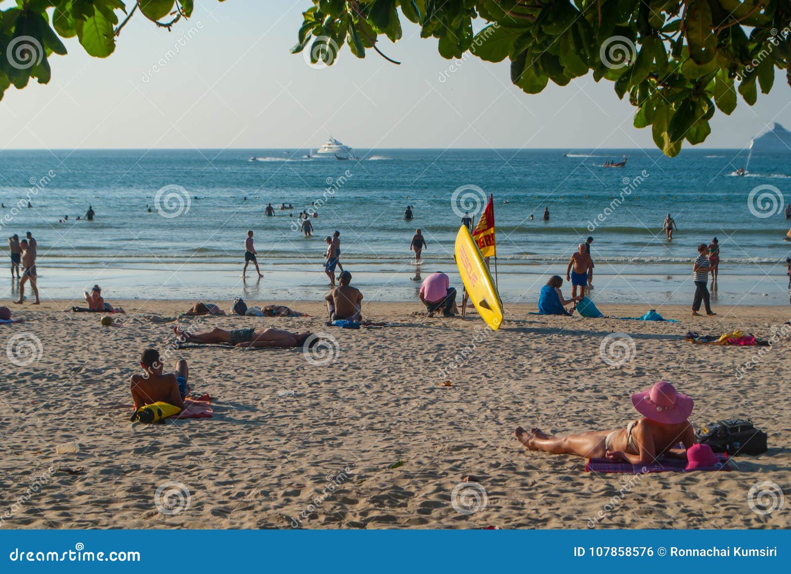 Sunbathe on the beach editorial photo. Image of beautiful - 107858576