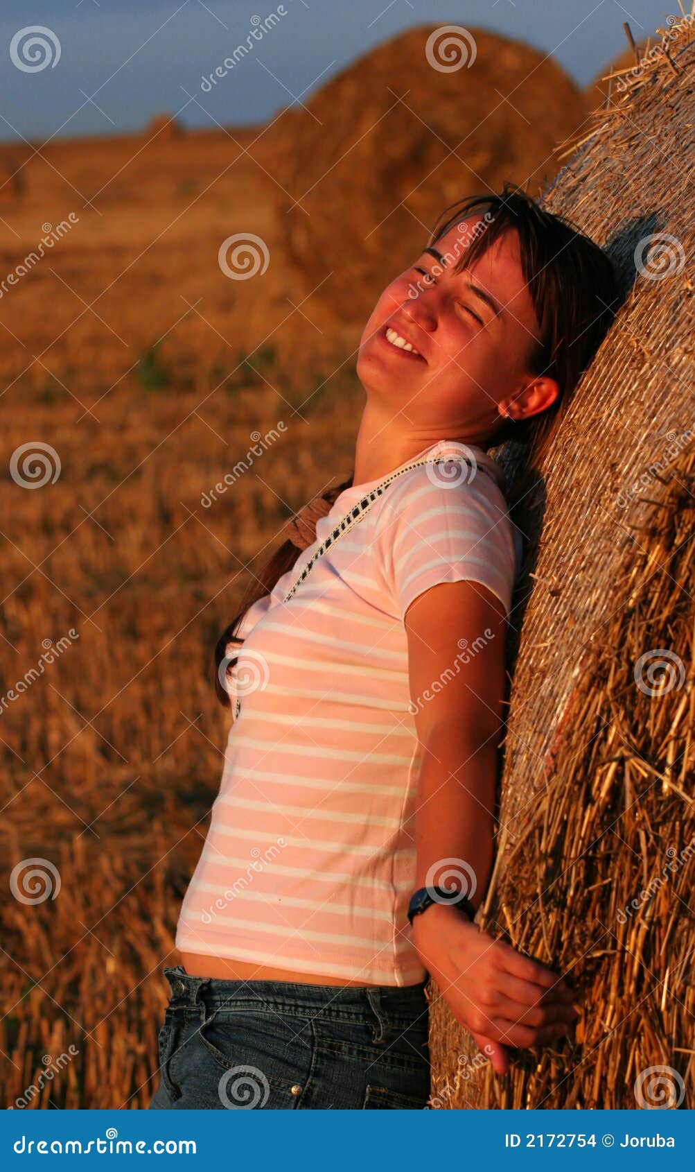 Sunbathing among bales stock photo. Image of delight, daydream - 2172754