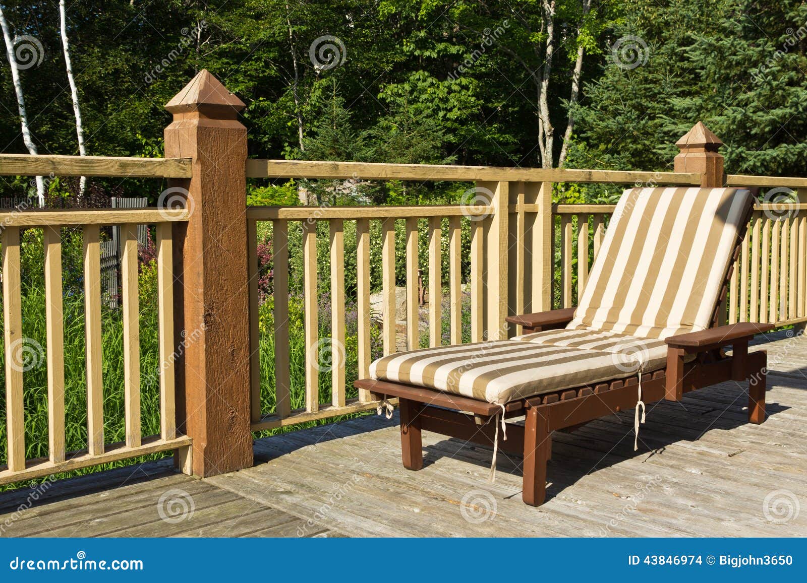 Sunbathing Chair on a Wooden Deck Stock Photo - Image of relaxation ...