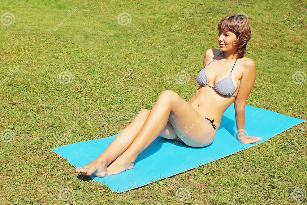 Sunbathing on nature stock photo. Image of human, grass - 20358814