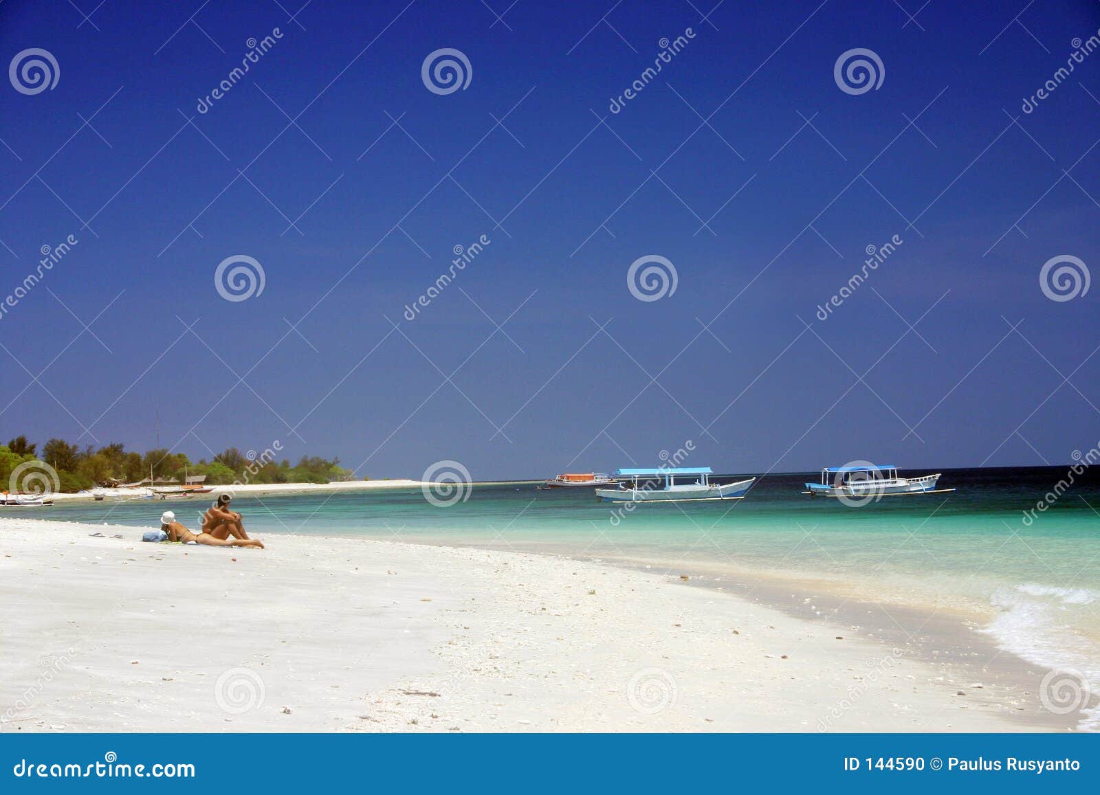 Sunbathing at Tropical Paradise Stock Photo - Image of island, paradise ...