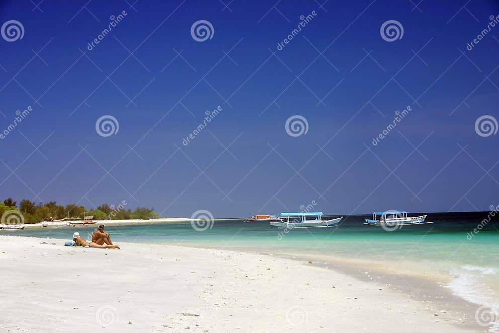 Sunbathing at Tropical Paradise Stock Photo - Image of island, paradise ...