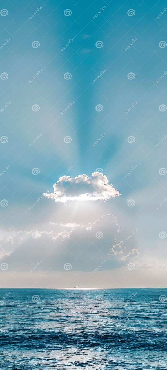 A Sunbeam through a Single Cloud Over the Ocean Providing a Dramatic ...