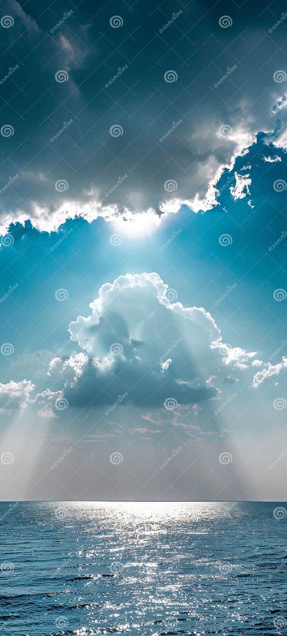 A Sunbeam through a Single Cloud Over the Ocean Providing a Dramatic ...