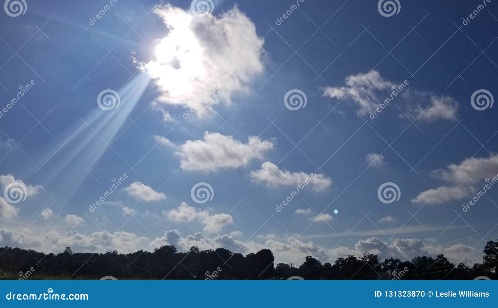 Sunbeam in the sky stock photo. Image of peeking, hollow - 131323870