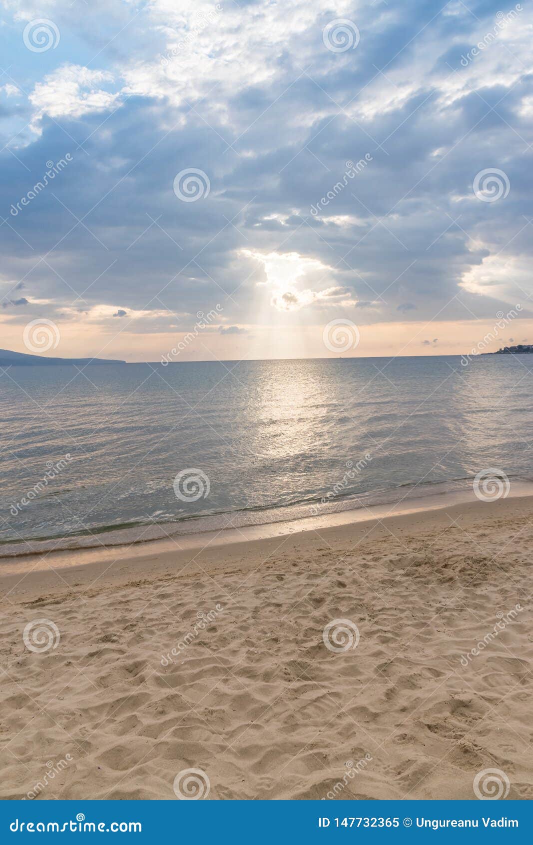 Sunbeams or Sun Rays Peeking through the Clouds at a Sunrise on ...