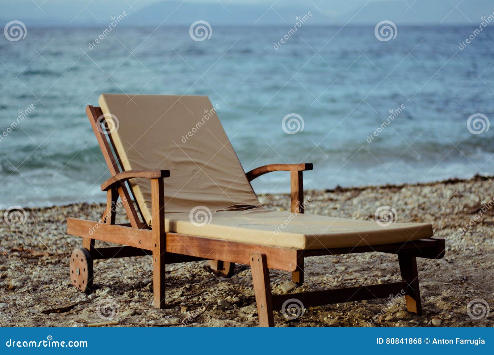 Sunbed on beach stock photo. Image of beach, pebbles - 80841868