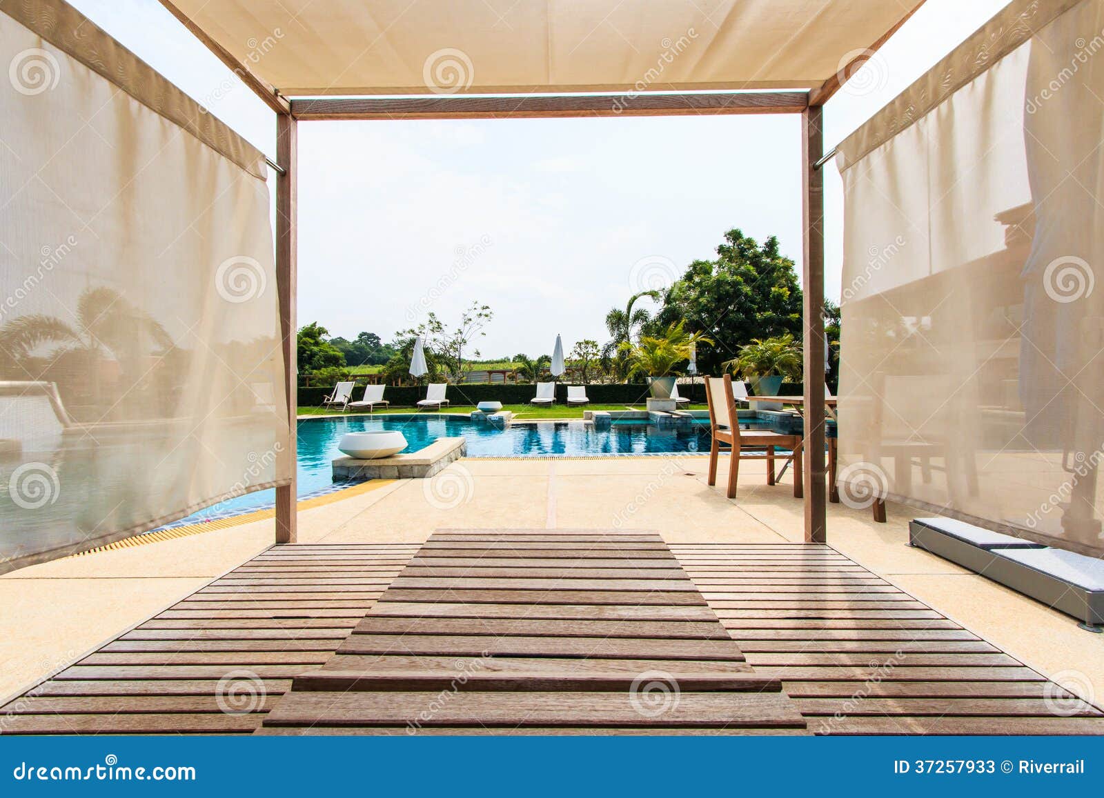 Sunbed Chair and Swimming Pool Stock Image - Image of scenic, beds ...