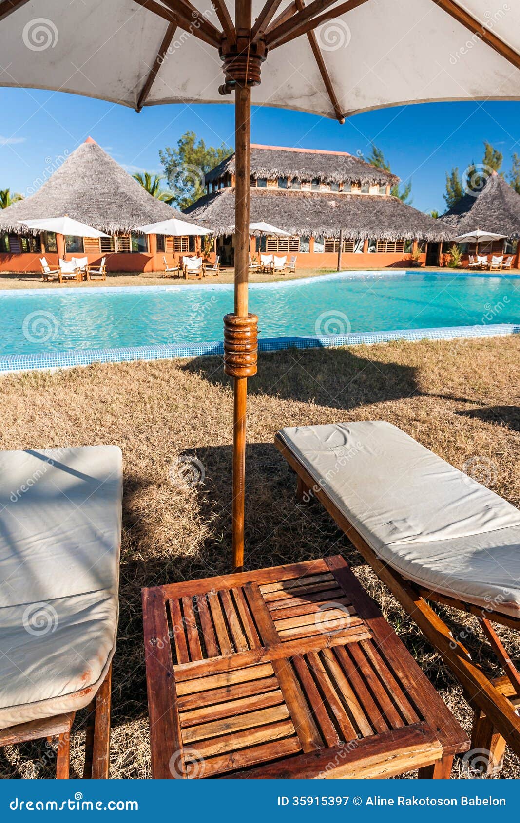 Sunbed and pool stock image. Image of coast, island, blue - 35915397