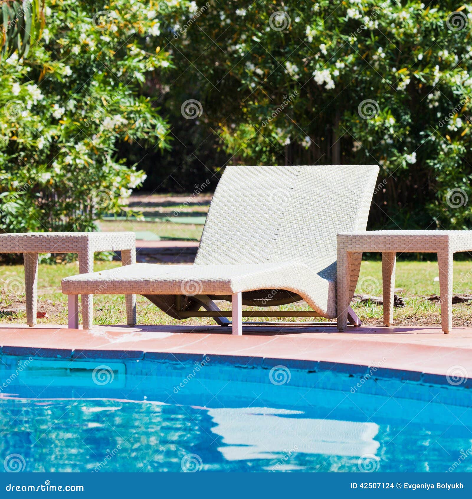 Sunbed and swimming pool stock photo. Image of details - 42507124