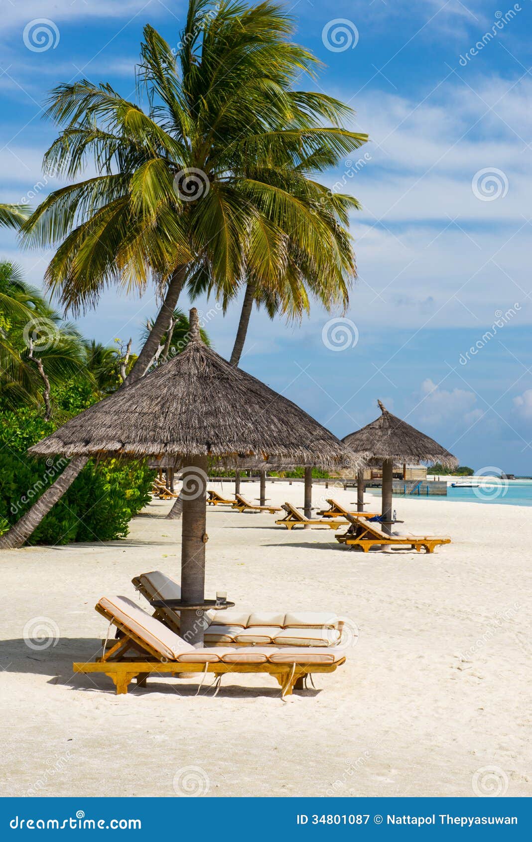Sunbeds on the beach stock image. Image of sunny, relax - 34801087