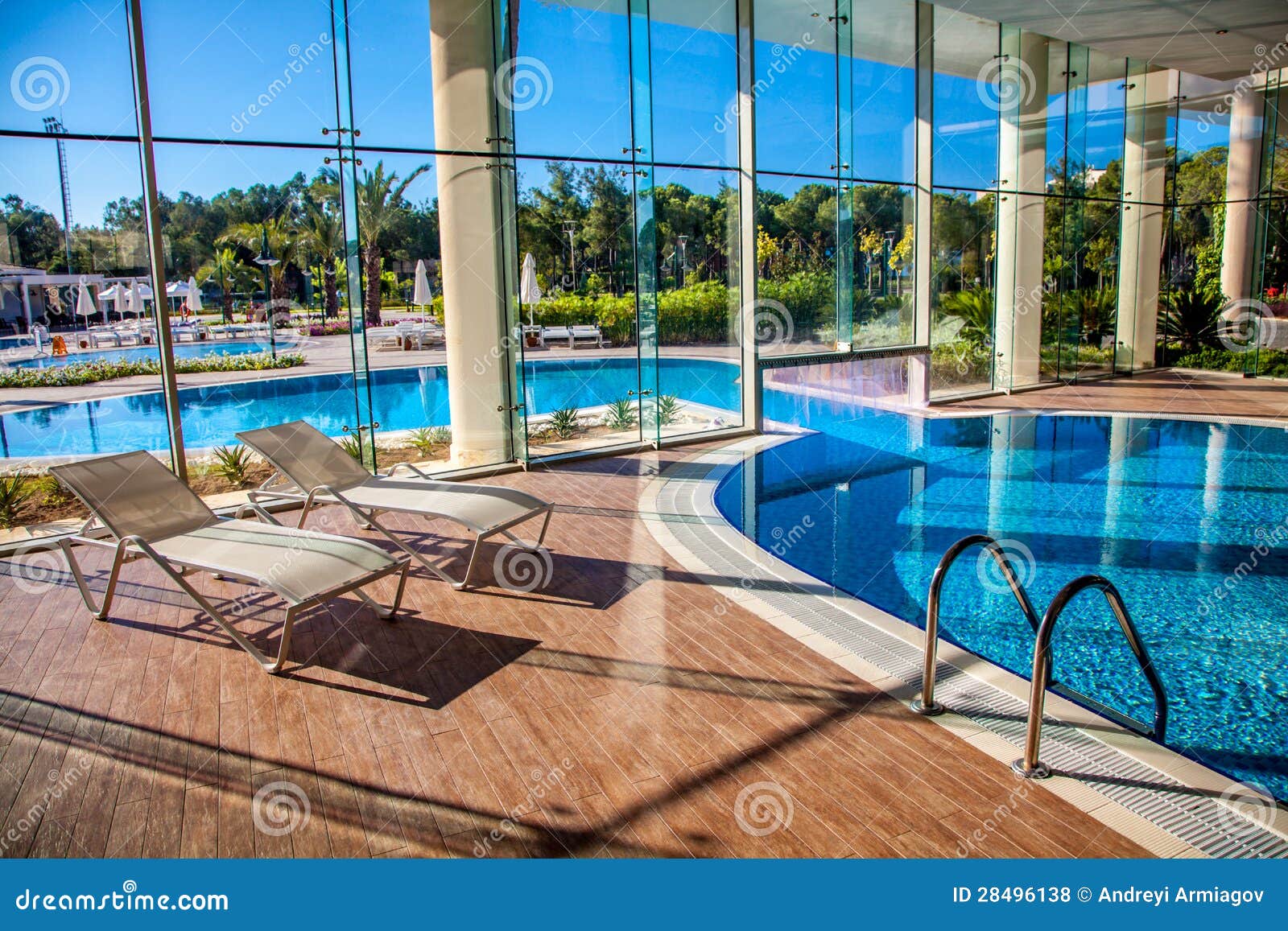 Sunbeds in the Indoor Swimming Pool Stock Photo - Image of luxury ...