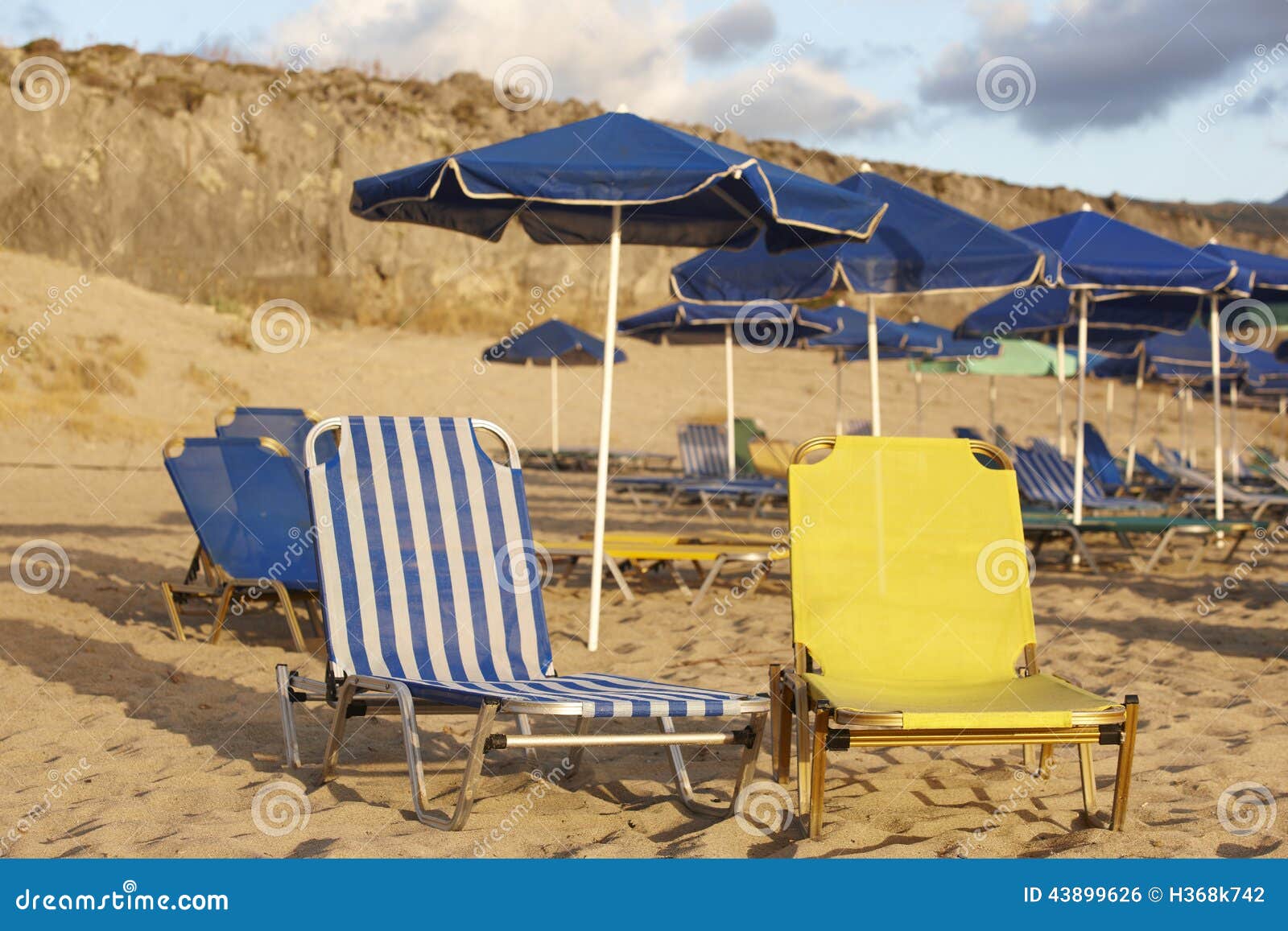 Sunbeds and Sunshades in a Mediterranean Beach. Crete Stock Photo ...