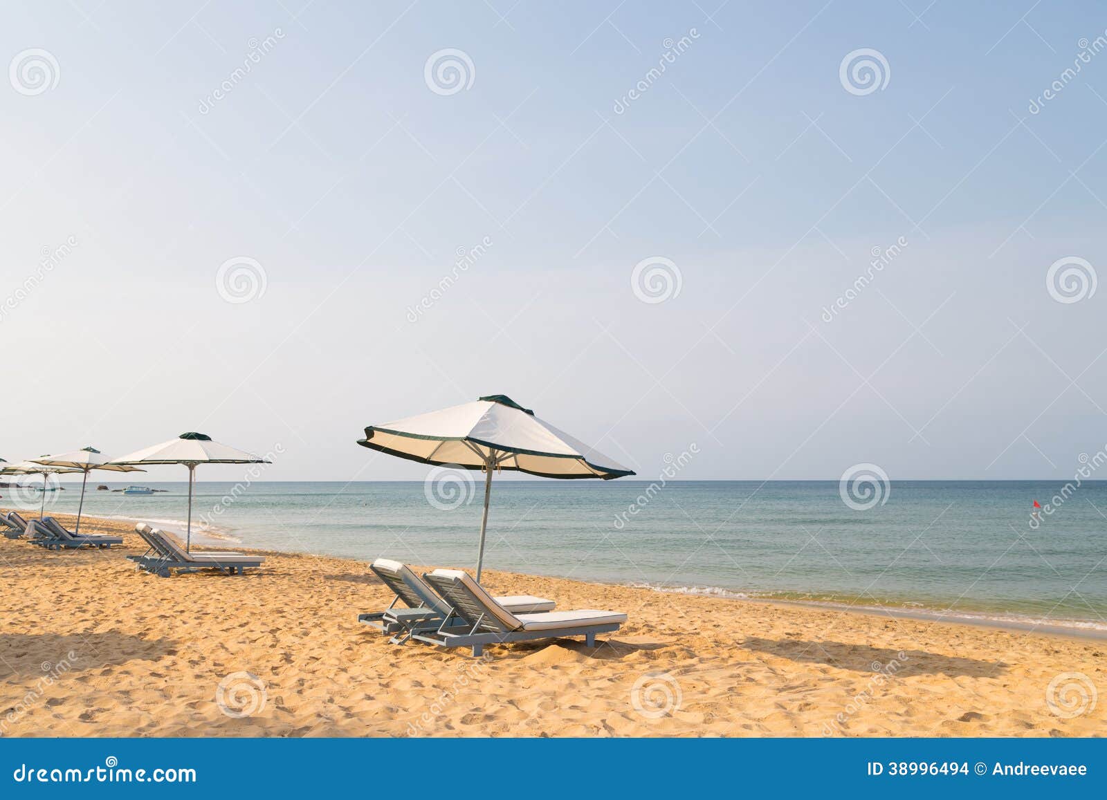 Sunbeds with Umbrellas on a Beautiful Sandy Beach Stock Photo - Image ...
