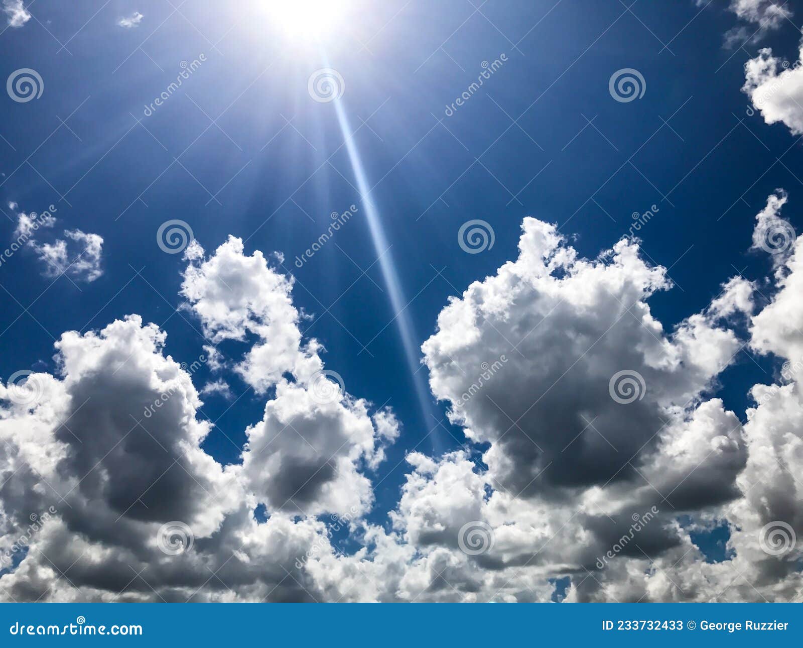 Sunburst Blue Sky stock image. Image of fluffy, atmosphere - 233732433