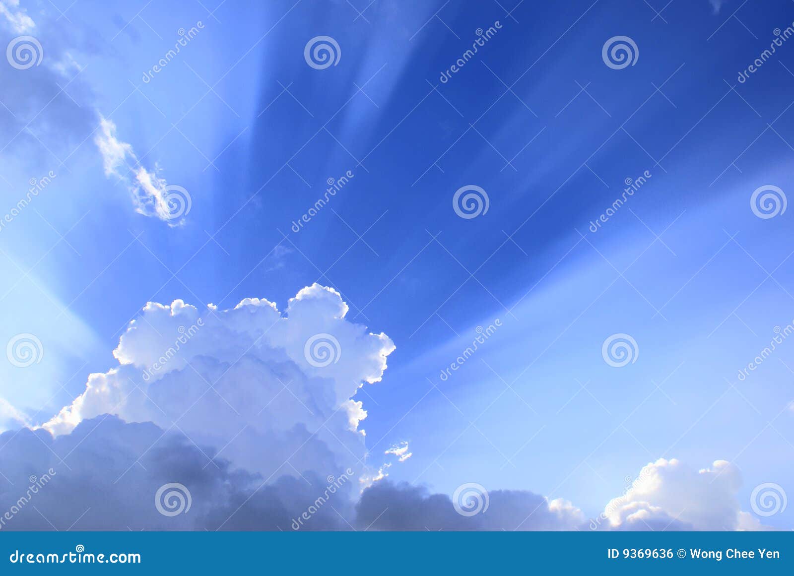 Sunburst light over clouds stock photo. Image of rays - 9369636