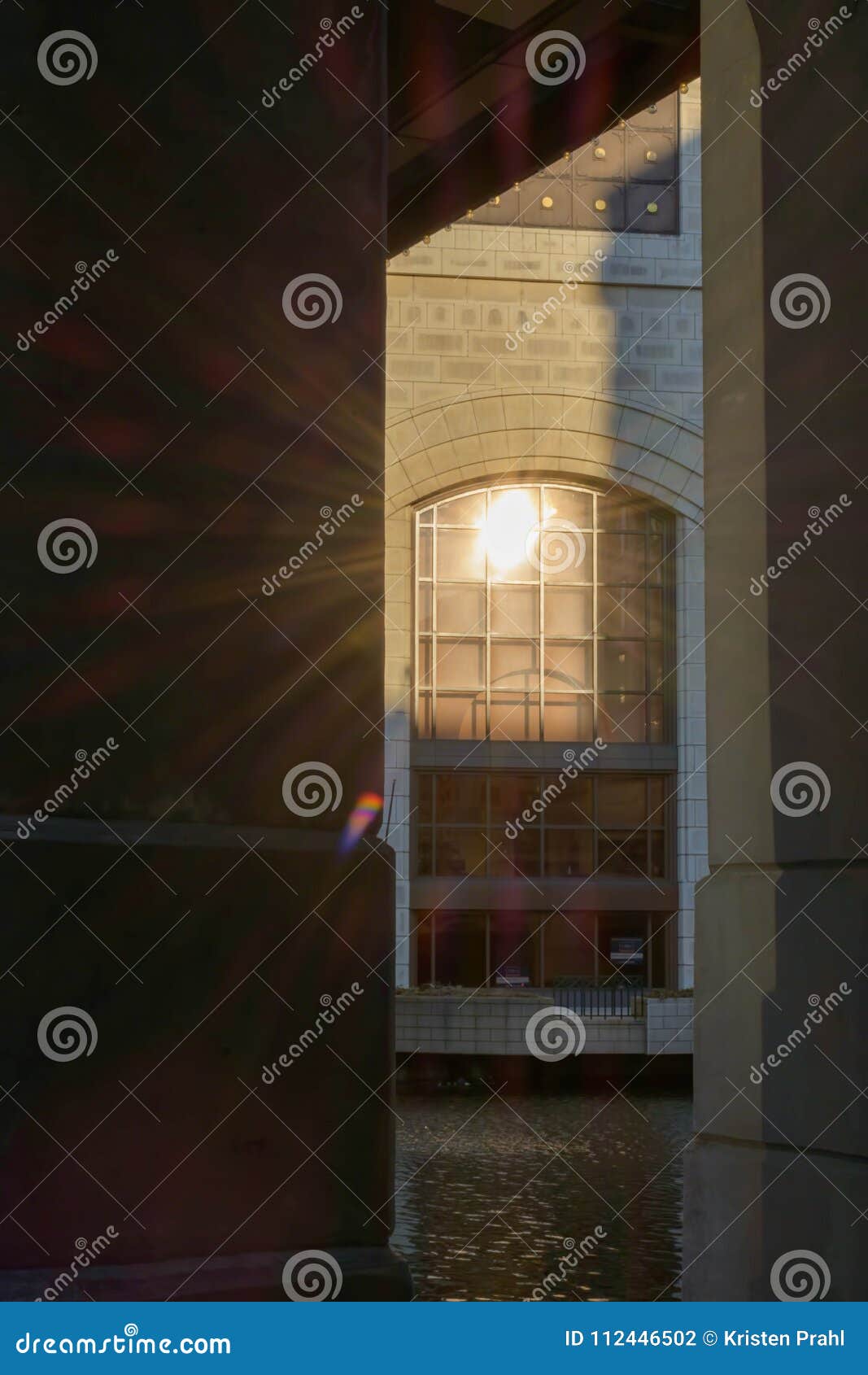 Sun Reflecting Off Windows on Riverfront Building Stock Photo - Image ...