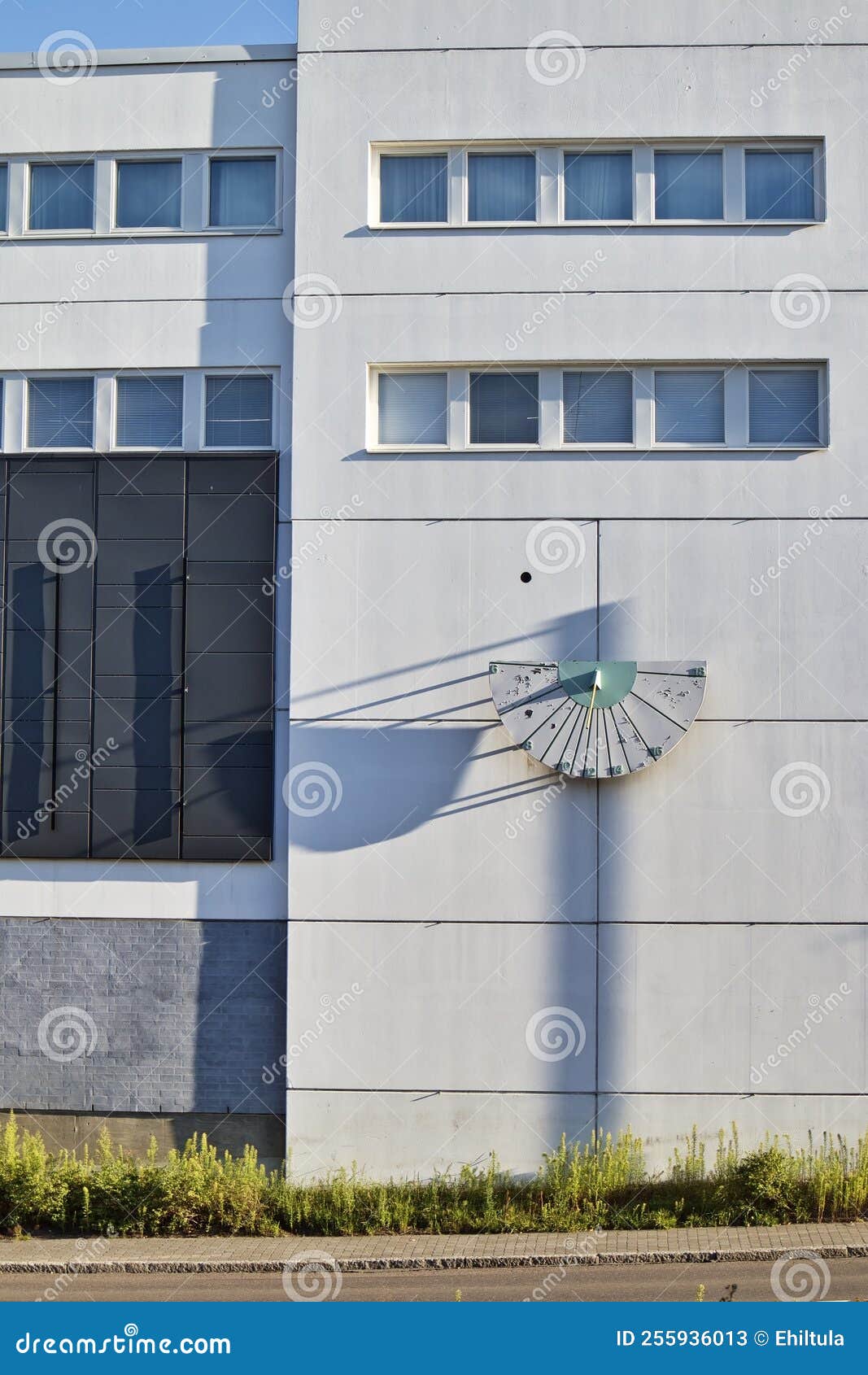 Sundial on a building wall stock image. Image of time - 255936013