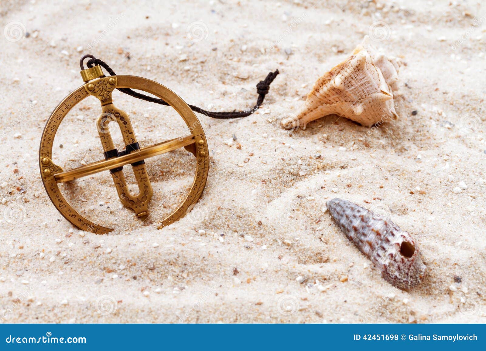 Sundial in the sand stock photo. Image of decoration - 42451698