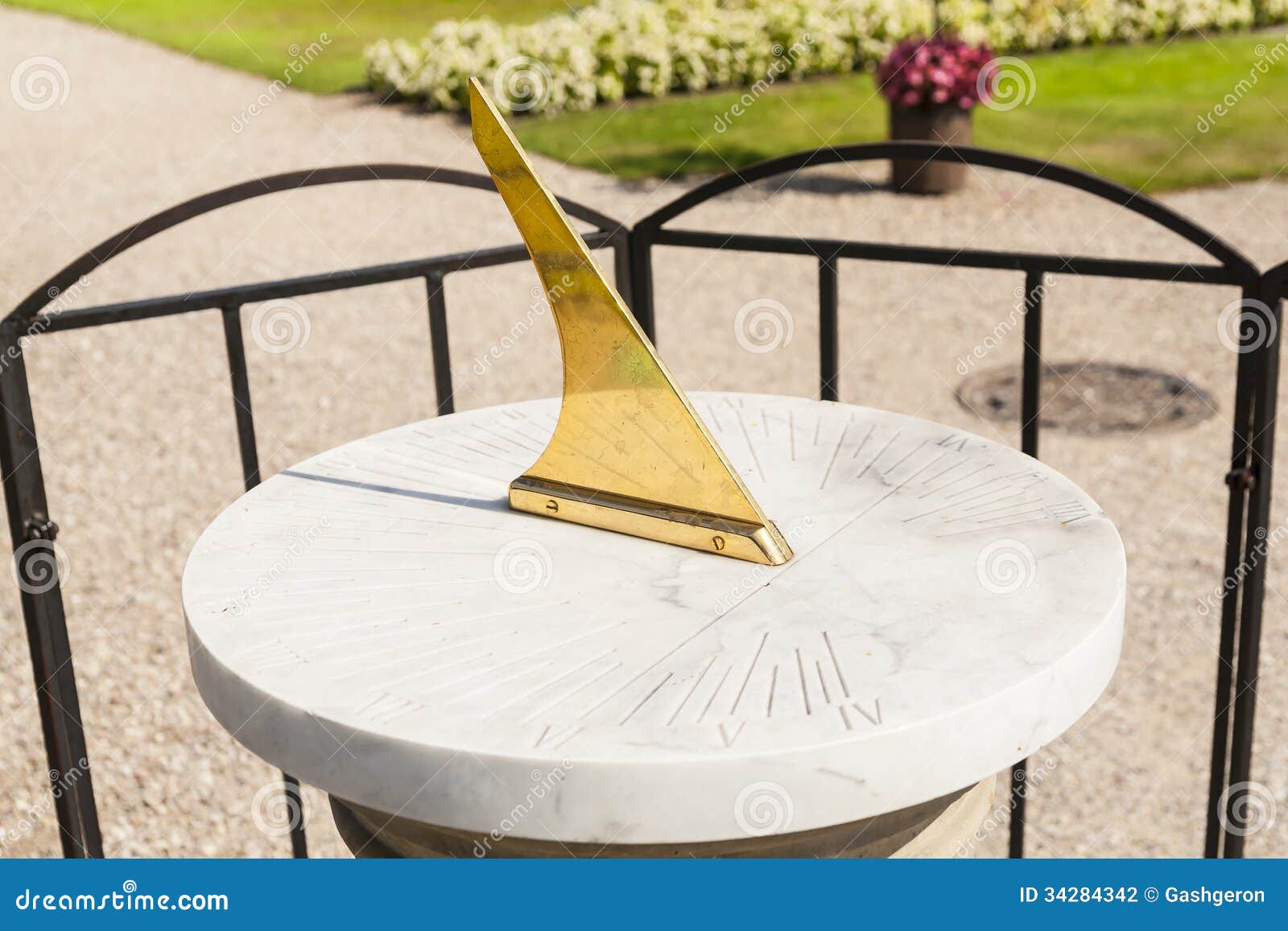 Sundial with White Marble Base Standing in Garden. Stock Photo - Image ...