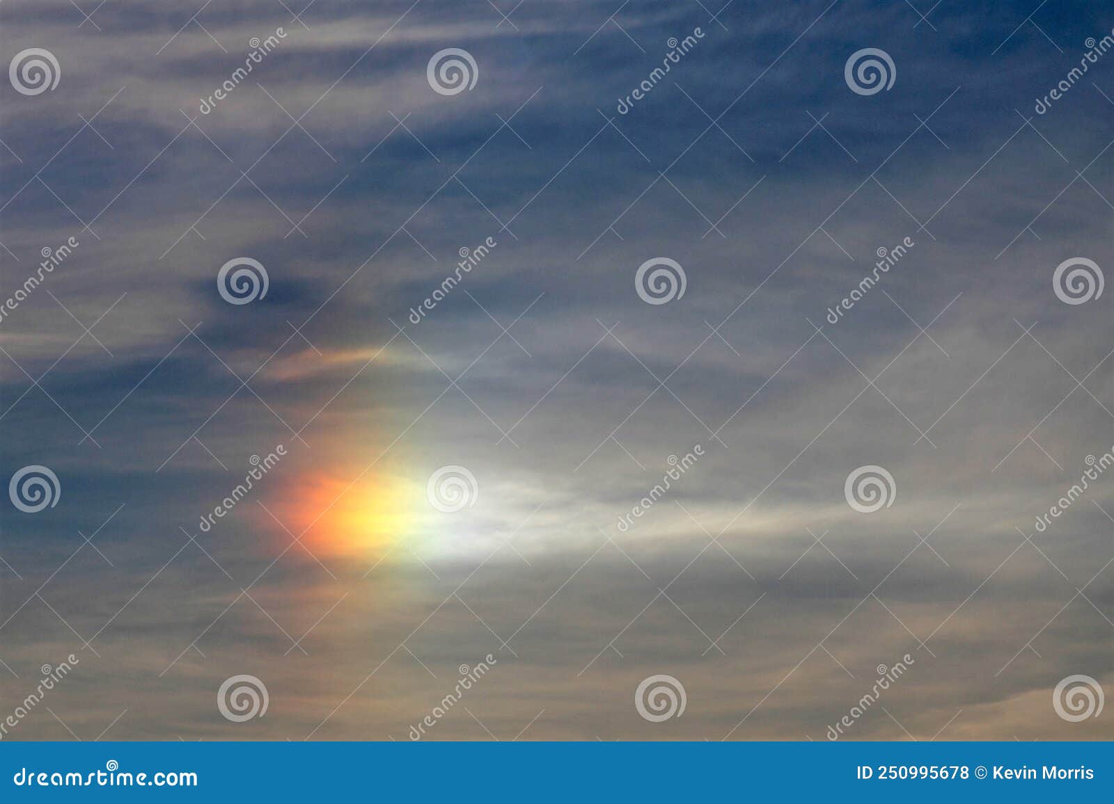 Sundog Visible within the Clouds and Blue Sky Stock Photo - Image of ...