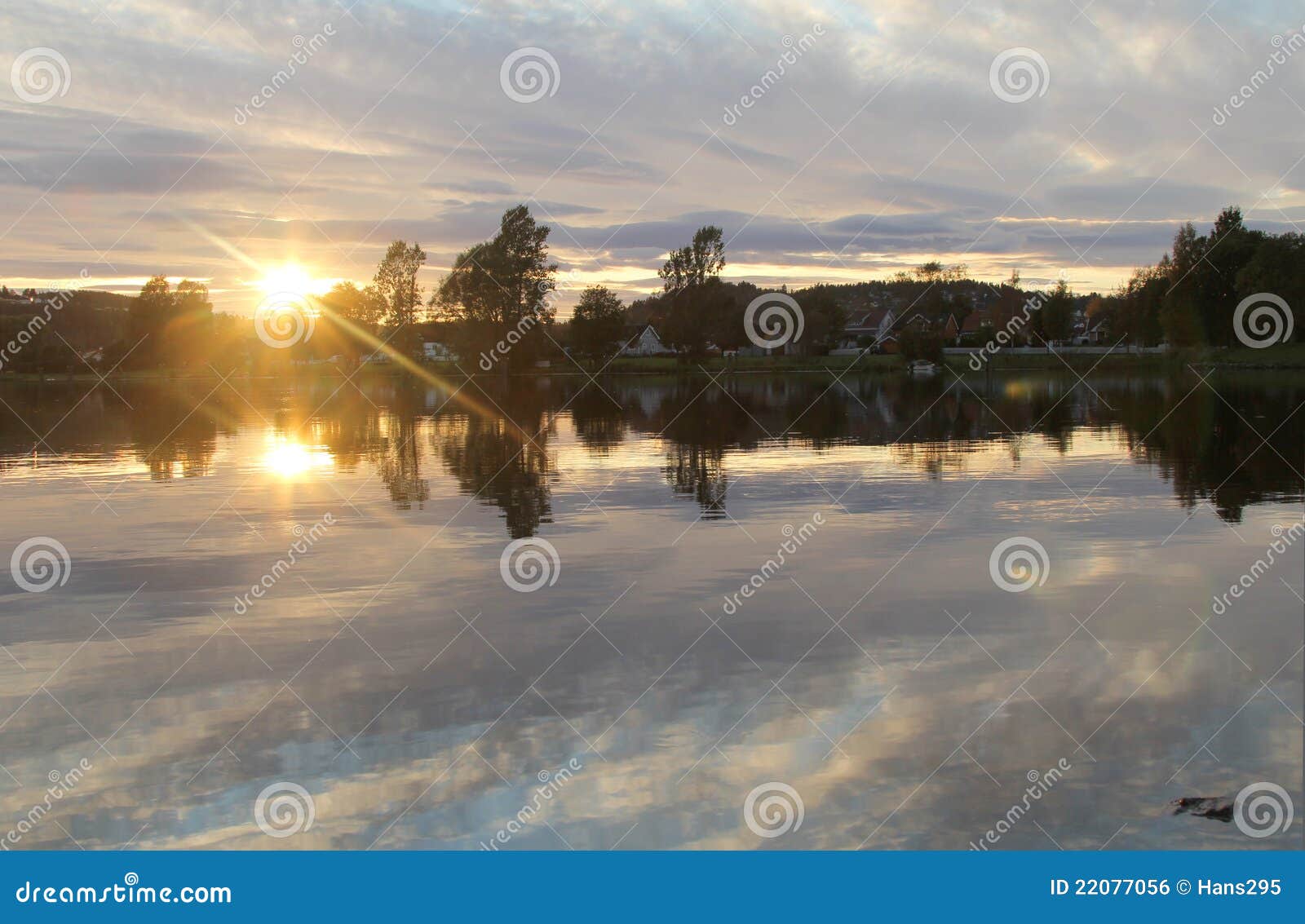 Sundown by the lake stock photo. Image of evening, city - 22077056