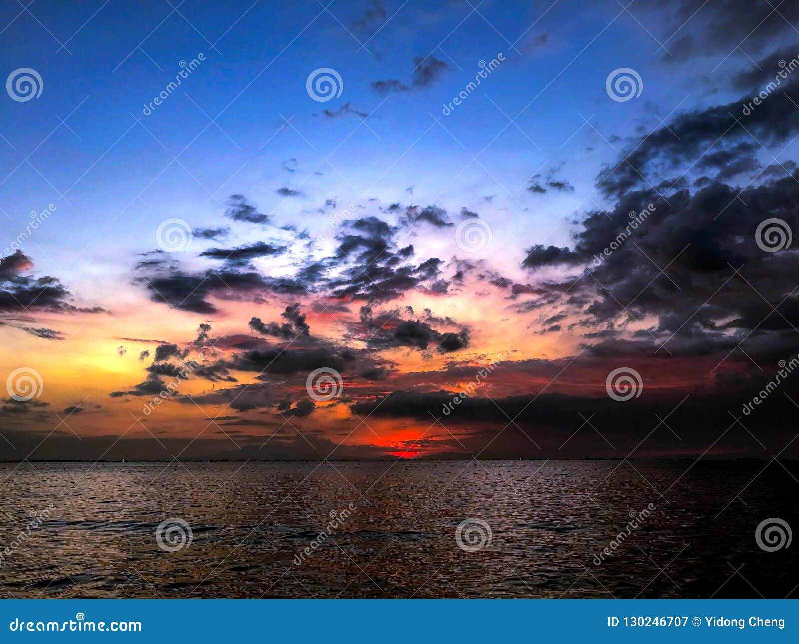Sundown over the sea stock image. Image of night, cover - 130246707