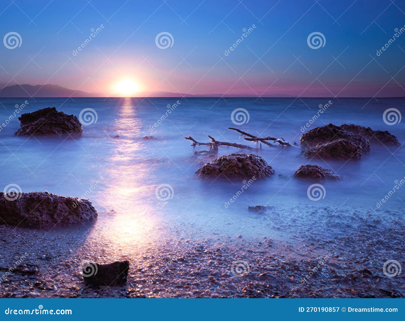 Sundowner at the beach stock image. Image of wave, sunrise - 270190857