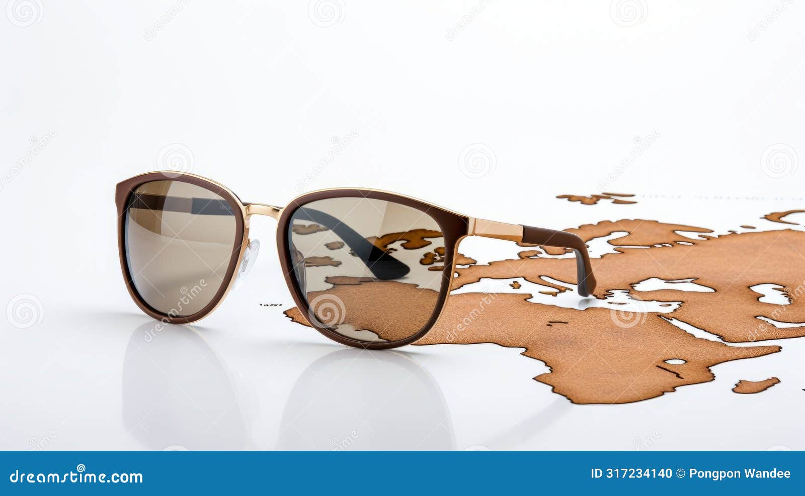 Sunglasses with Brown Frames beside a World Map on a White Surface ...