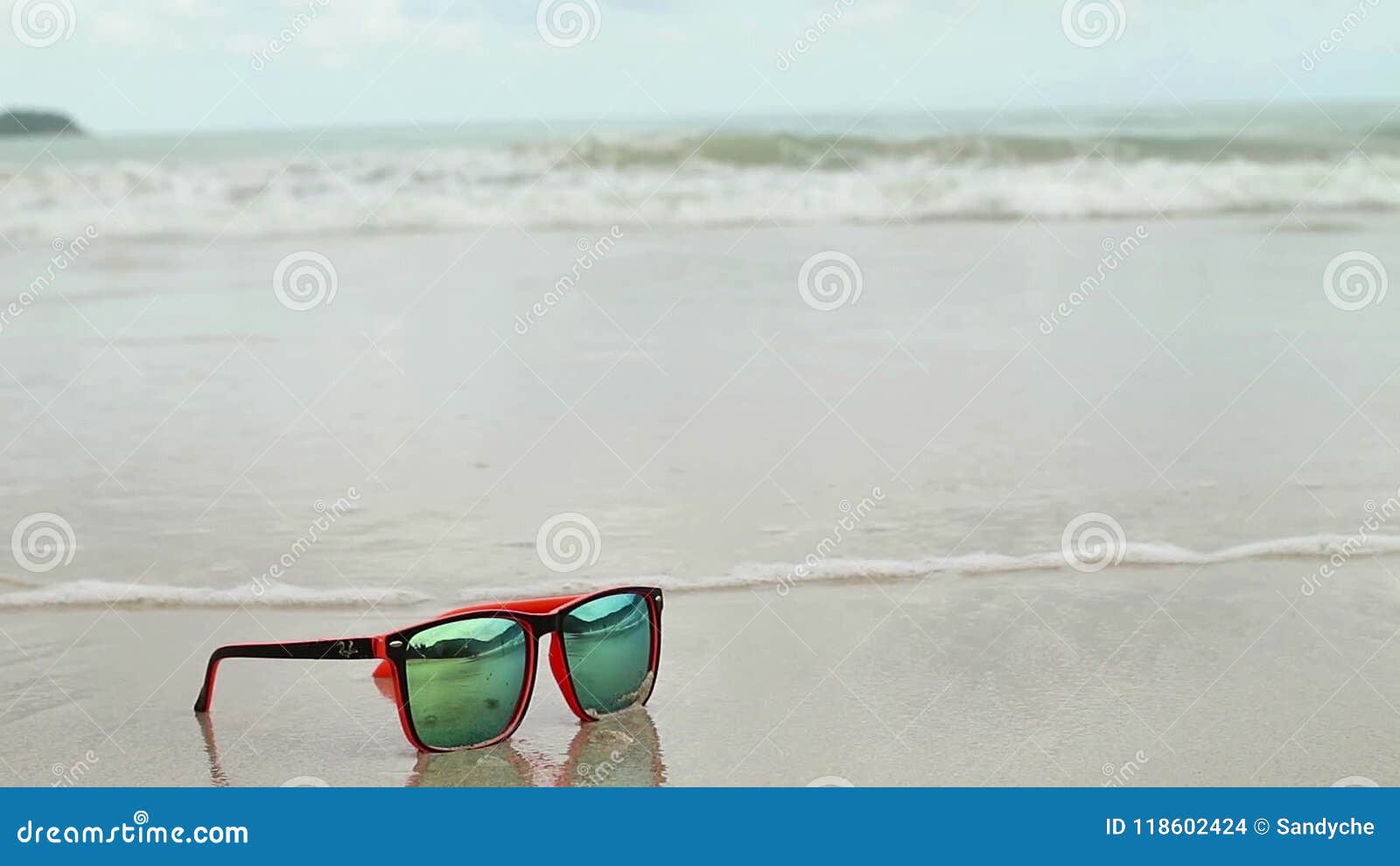 Sunglasses Lying in Sand on a Beach. in a Sunglasses Reflected Sea ...