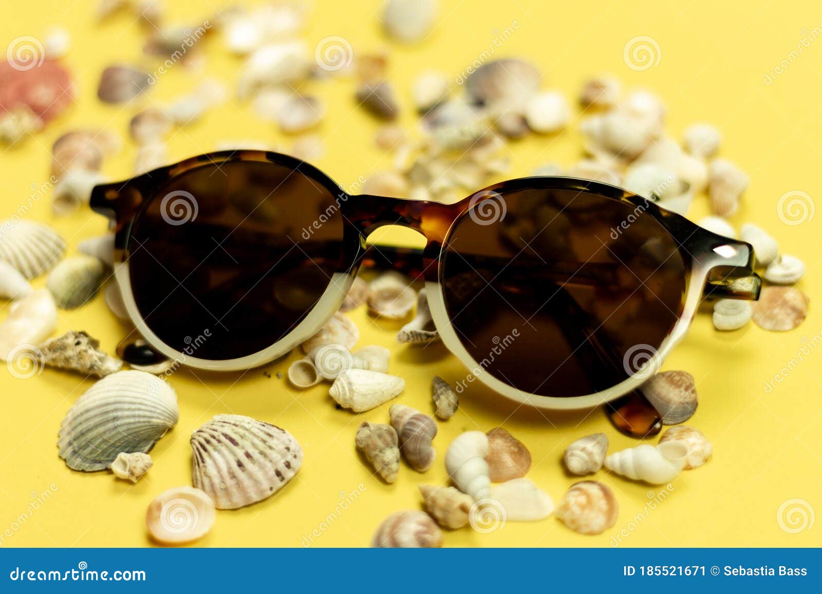 Sunglasses, Shells and Pebbles Closeup on White Background Stock Image ...