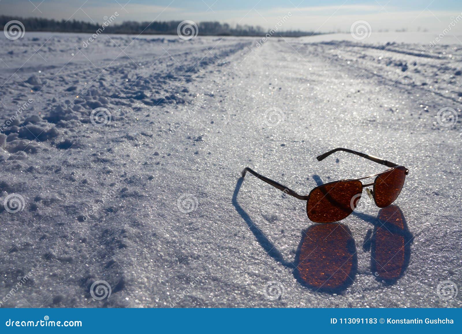 Sunglasses on the snow stock image. Image of glasses - 113091183