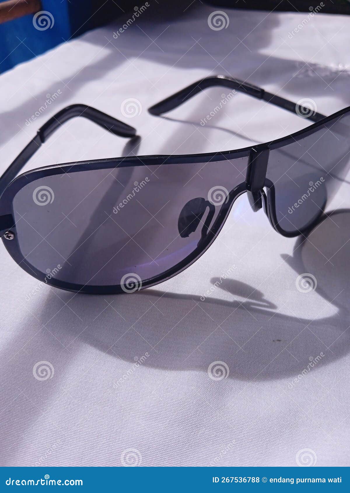 Sunglasses on the table stock photo. Image of black - 267536788