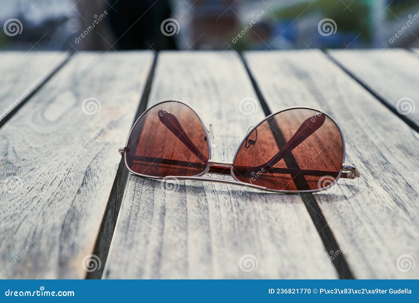 Sunglasses on a table stock photo. Image of desk, urban - 236821770