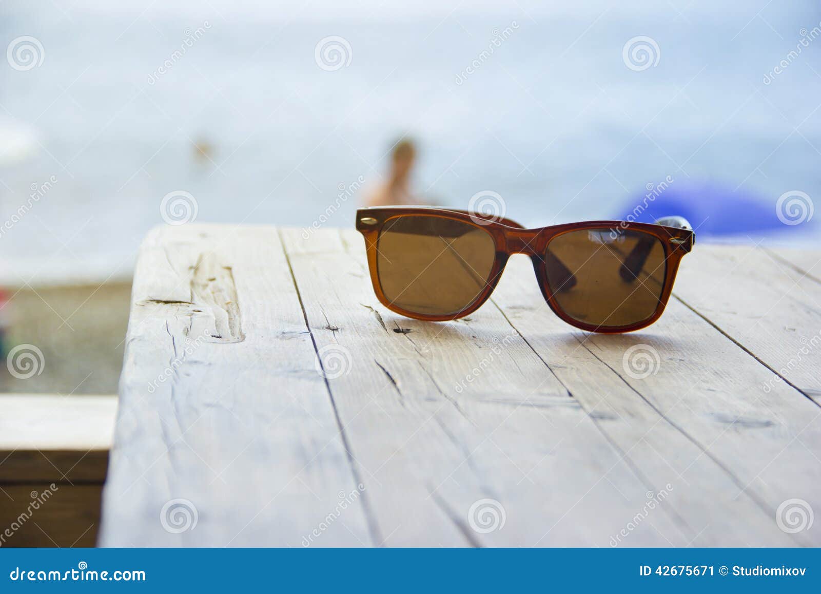 Sunglasses on the table stock image. Image of object - 42675671