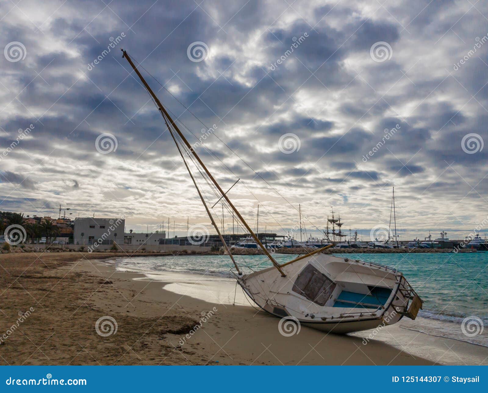 Sunken Sailboat Washed Up Ashore Stock Image - Image of breakage, lost ...